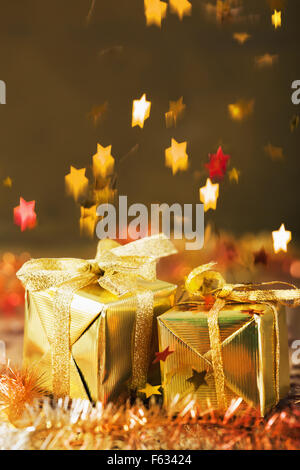 Falling Christmas gifts Stock Photo - Alamy
