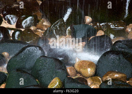 Water splash on black volcanic rocks of Tenesar, Lanzarote, Canary ...