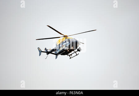 A Metropolitan Police helicopter flies over London to observe crowd ...