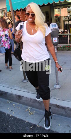 NeNe Leakes visits a nail salon with her husband Gregg Leakes Featuring ...