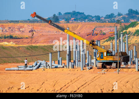 Piling construction work on a piece of flat land Stock Photo - Alamy