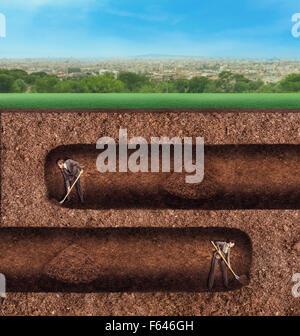 Businessman and businesswoman dig a tunnel underground towards each ...