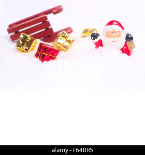 Santa Claus sledge accident in deep snow with gifts around Stock Photo ...