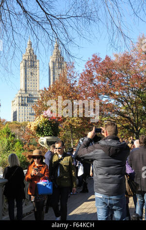 Bow Bridge and fall colors in Central Park with Manhattan Upper West ...