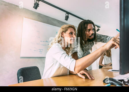 People discussing new design of project Stock Photo - Alamy