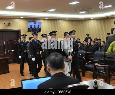 Harbin. 13th Nov, 2015. Defendants Gao Yulun (R), Wang Damin (C) and Li ...