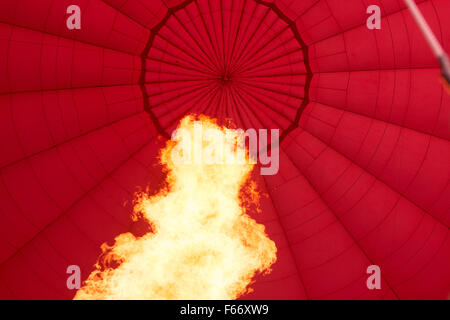 Inflating an air balloon with hot air with help of gas-jet Stock Photo ...