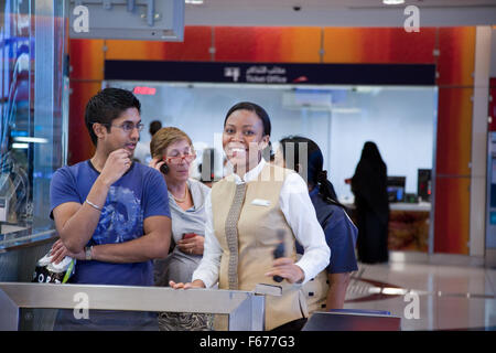 Staff assistance in the Dubai Metro Stock Photo - Alamy