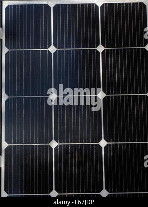 Close-up new solar panels with protective cardboard corners, ready for ...