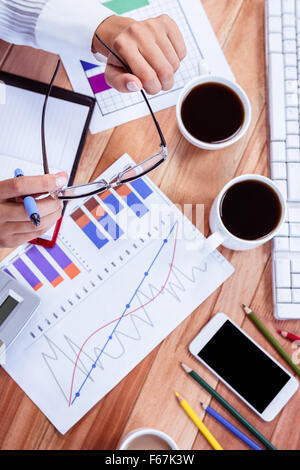 Business workplace with office stuff and tablet with padlock icons on ...