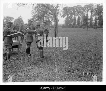 Presentation of medals by General Godley, General Godley presents a ...
