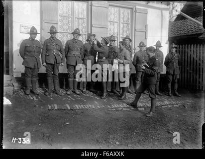 Inspecting soldiers' teeth during World War I, Soldiers undergo an ...
