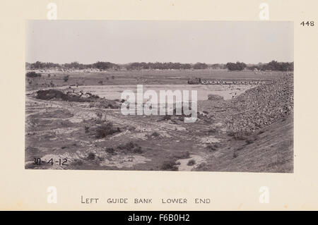 The left guide bank at the lower end of a railroad bridge construction ...
