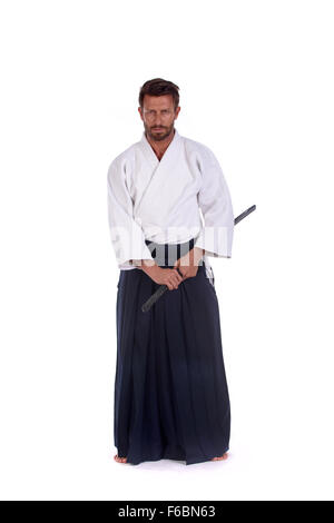 Portrait of aikido sensei master with black sensei belt in taekwondo ...