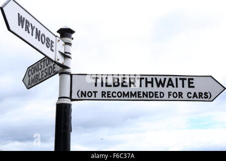 Old Fashioned road sign giving directions in the English Lake District ...