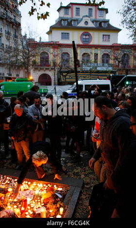 Flowers lay in front of the Bataclan concert hall as Paris is marking ...