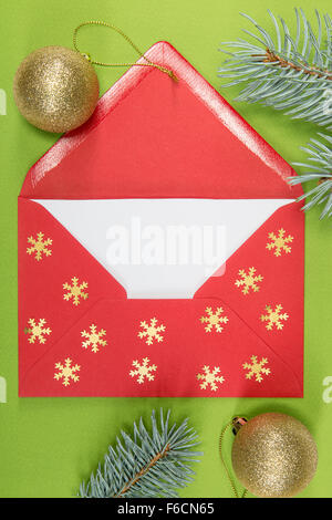 envelope with Christmas letter postcard on green background Stock Photo ...