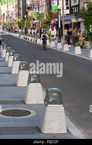Bicycle lane in Japan - cycling path markings in Kyoto Stock Photo - Alamy