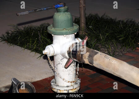 Fire hydrant hose connection fire fighting equipment Stock Photo - Alamy