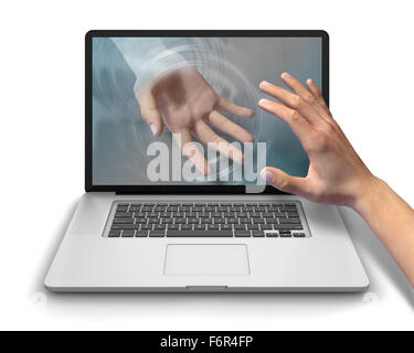 Hand reaching out of laptop screen to steal money Stock Photo - Alamy