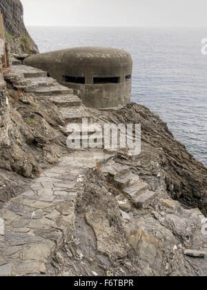 The remains of a WWII concrete pillbox bunker overlooking Sennen Cove ...
