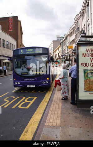 Bus stopping in Nottingham city centre Stock Photo - Alamy