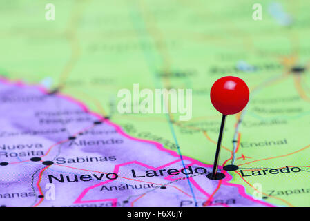 Close up to a Nuevo Laredo city with a red pin needle into Mexico ...
