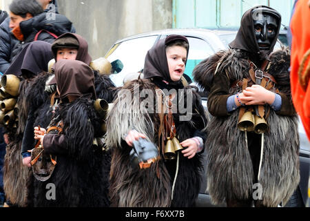 children in Mamuthones Sardinian mask at Carnival of Mamoiada, Sardinia ...