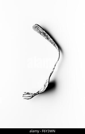 Close up found still life of discarded mountain bike against tree in ...