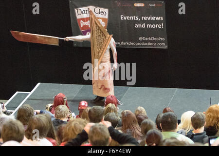 Newcastle, UK. 21st Nov, 2015. Cosplay competition competitor acts out ...