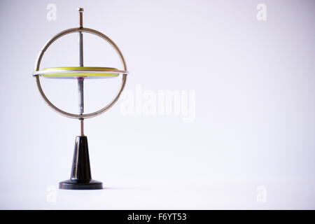 Gyroscope composed of a free rotating wheel and a spinning axis, uses ...