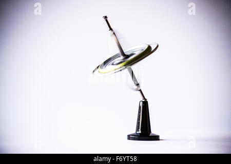 Gyroscope composed of a free rotating wheel and a spinning axis, uses ...