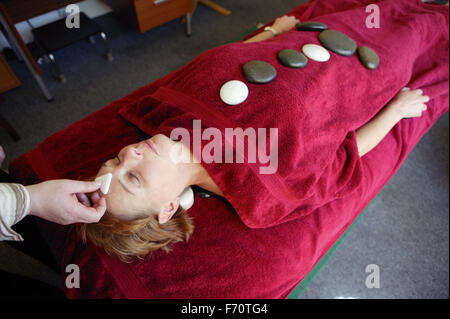 Patient having La Stone Therapy Stock Photo - Alamy