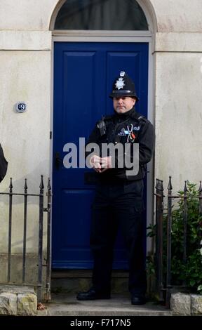 A police officer guarding the front door of number 10 Downing Street ...