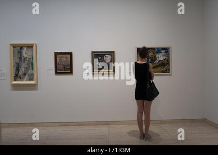 woman inside art gallery Stock Photo - Alamy