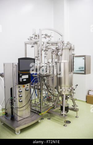 Large vat with taps and pumps Stock Photo - Alamy