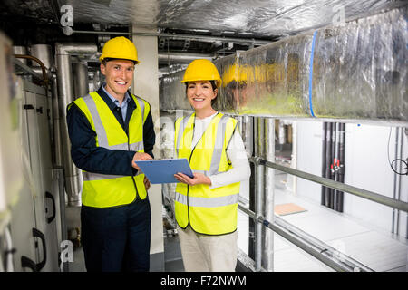 Woman working in the boiler room Stock Photo - Alamy