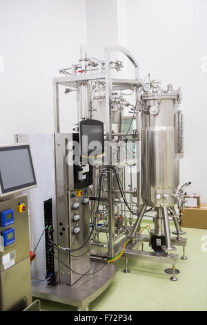 Large vat with taps and pumps Stock Photo - Alamy