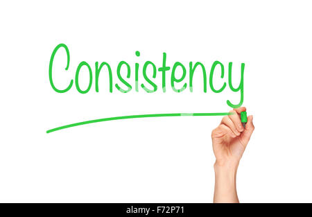 Hand writing sign Be Consistent. Business showcase Uniform Persistent ...