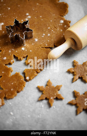 baking christmas star shape cookies. fresh dough Stock Photo - Alamy