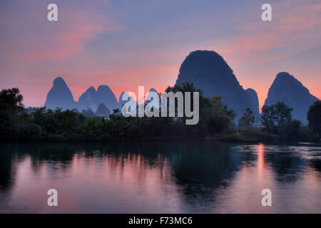 Limestone Karst Formations reflected in River Li Guilin Region Guangxi ...