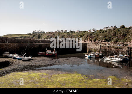 Fishing boats, tides out Stock Photo - Alamy