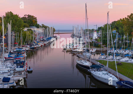 Sailboats along Sixteen Mile Creek at the Oakville Harbour at sunset ...