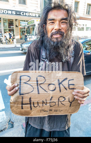 The Asian middle aged man standing on the red background Stock Photo ...
