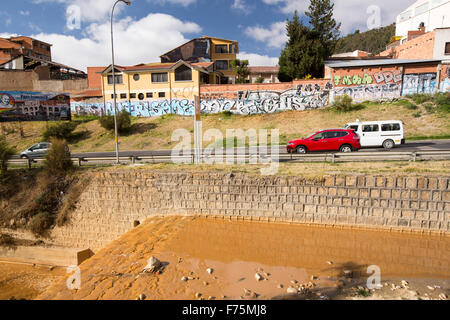 BOLIVIA POLLUTION IN A RIVER CROSSING THE SUBURBS OF EL ALTO IN LA PAZ ...