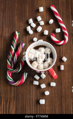 Peppermint hot chocolate with marshmallow and candy cane sweets in ...