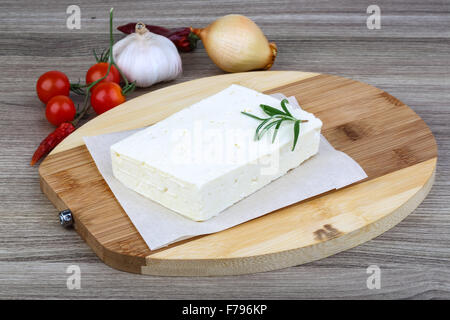 Traditional Caucasian homemade Cheese Brinza with rosemary on wood ...