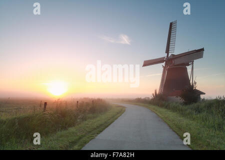 Beautiful sunrise behind windmill, Netherlands Stock Photo - Alamy