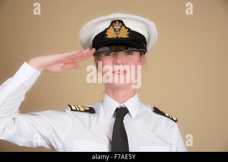 Female navy officer in uniform of a Lt Commander wearing a hat and ...