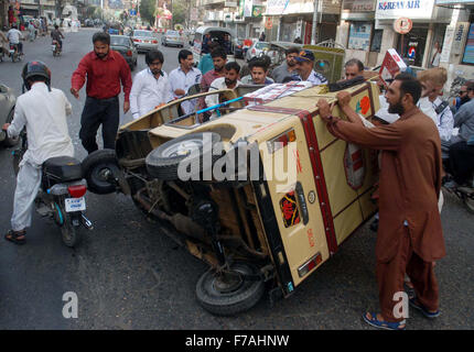 An overloaded auto rickshaw strayed off due to over speeding near ...